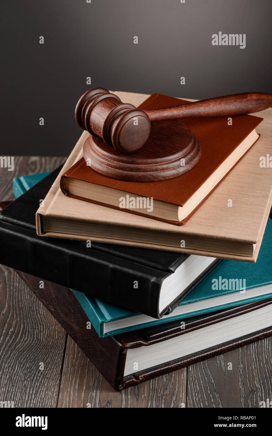 Stack of books and gavel Stock Photo - Alamy