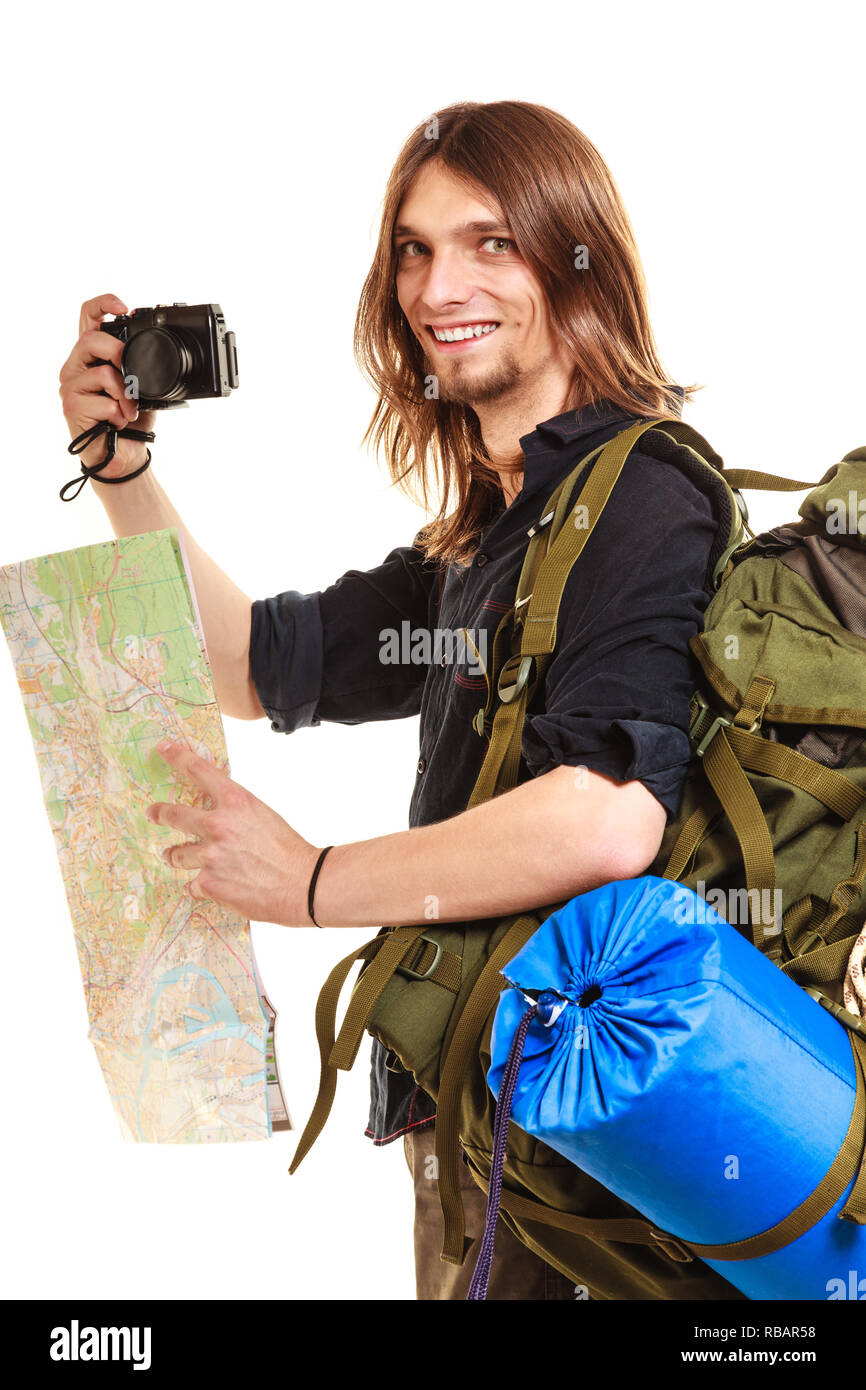 Man tourist backpacker on trip taking photo picture with camera. Young ...