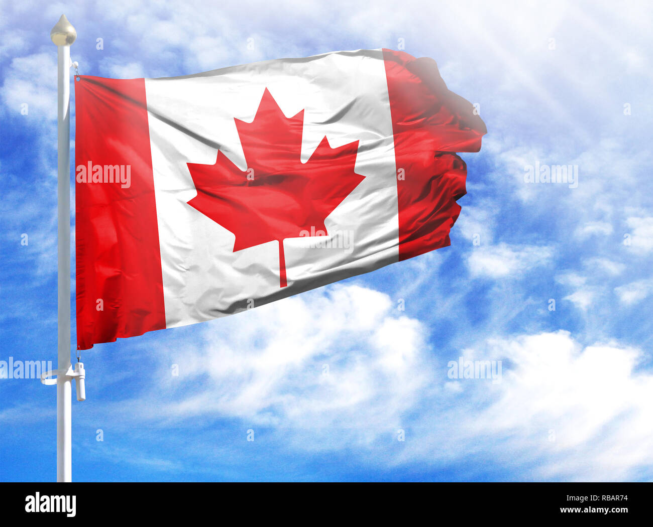 National flag of Canada on a flagpole in front of blue sky Stock Photo ...
