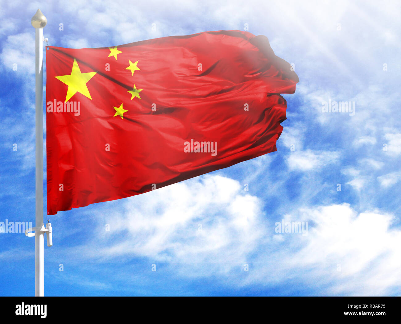 National flag of China on a flagpole in front of blue sky Stock Photo ...