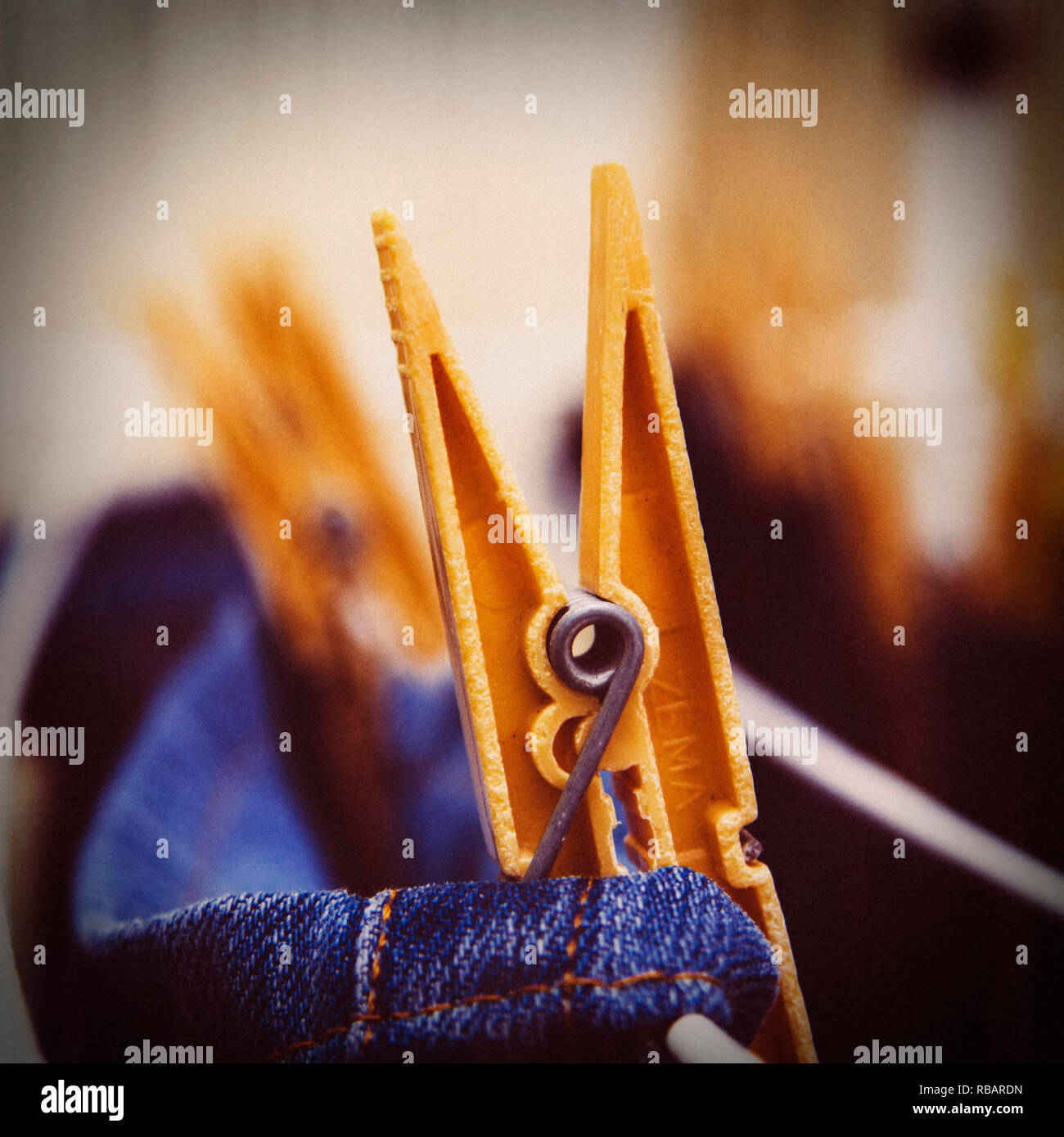 Clothes peg holding denim hi-res stock photography and images - Alamy