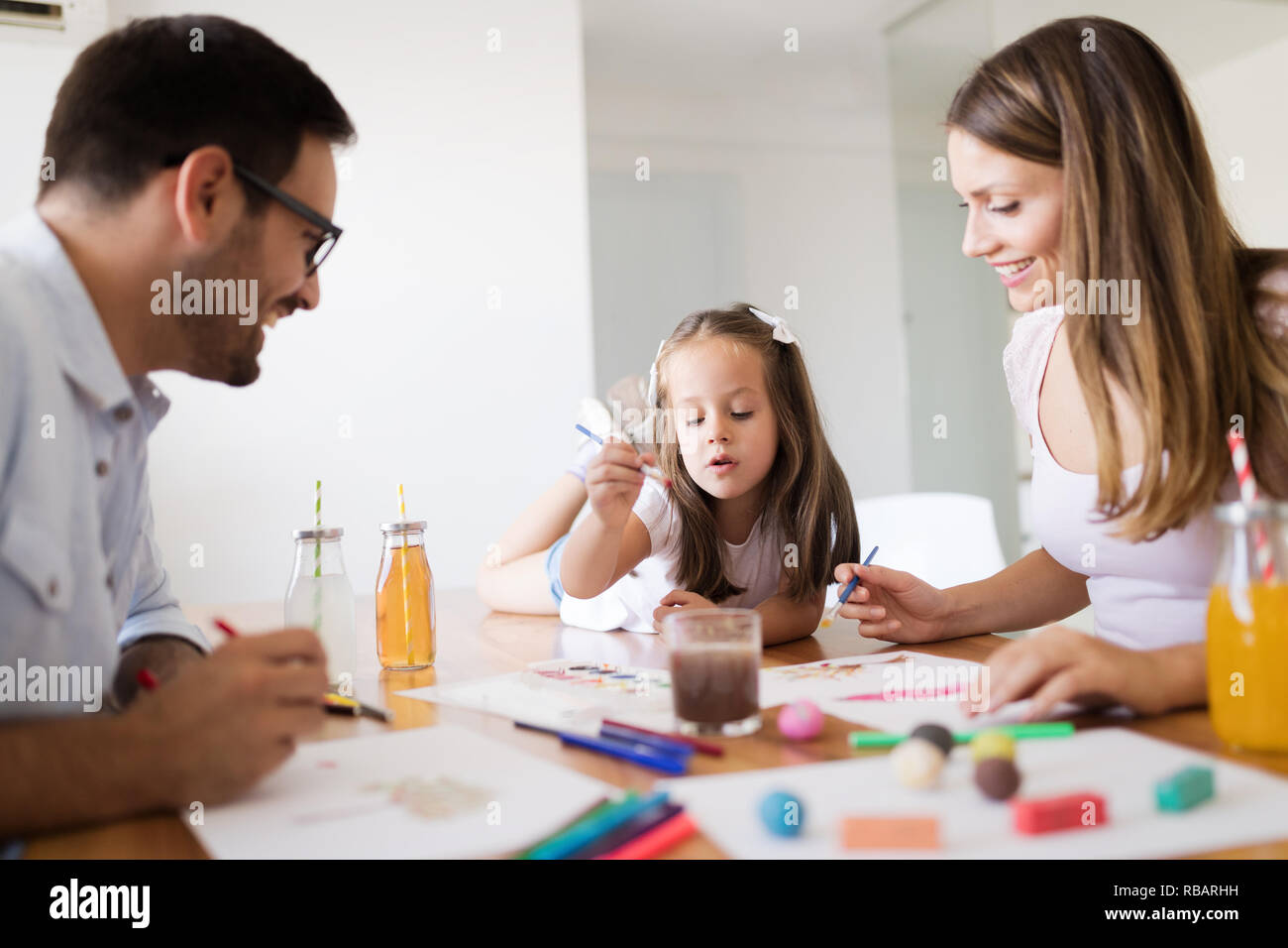 Happy family having fun time at home Stock Photo - Alamy