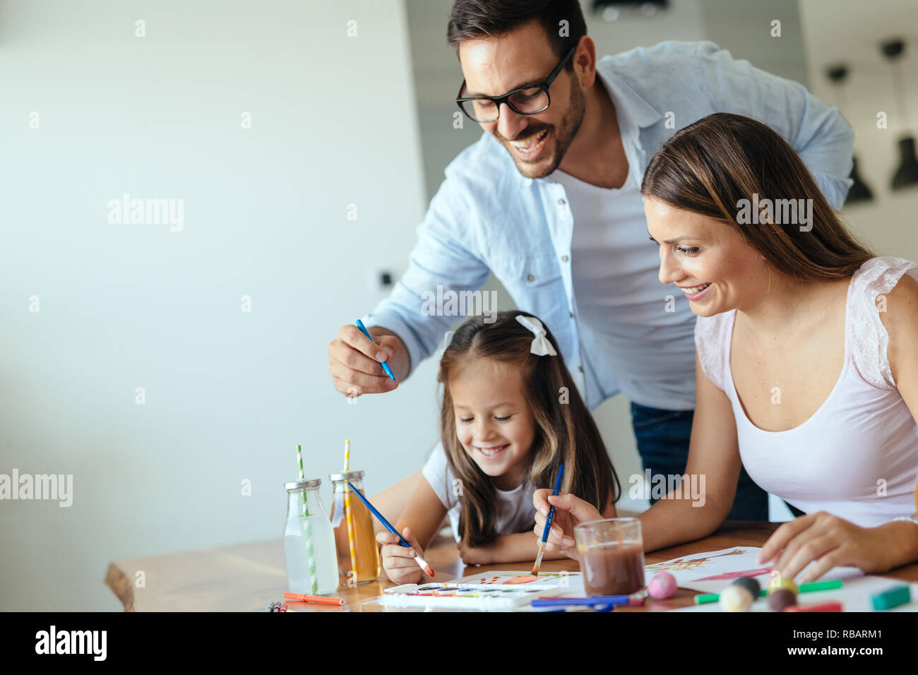 Happy family having fun time at home Stock Photo - Alamy