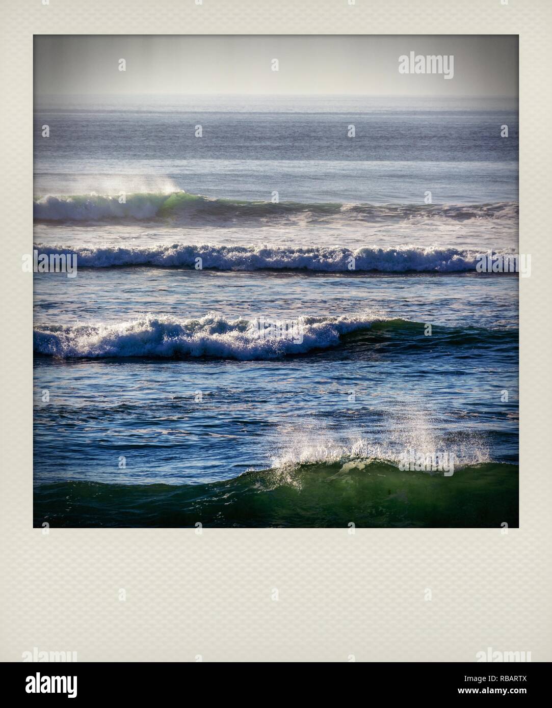 Polaroid photograph of waves Stock Photo - Alamy