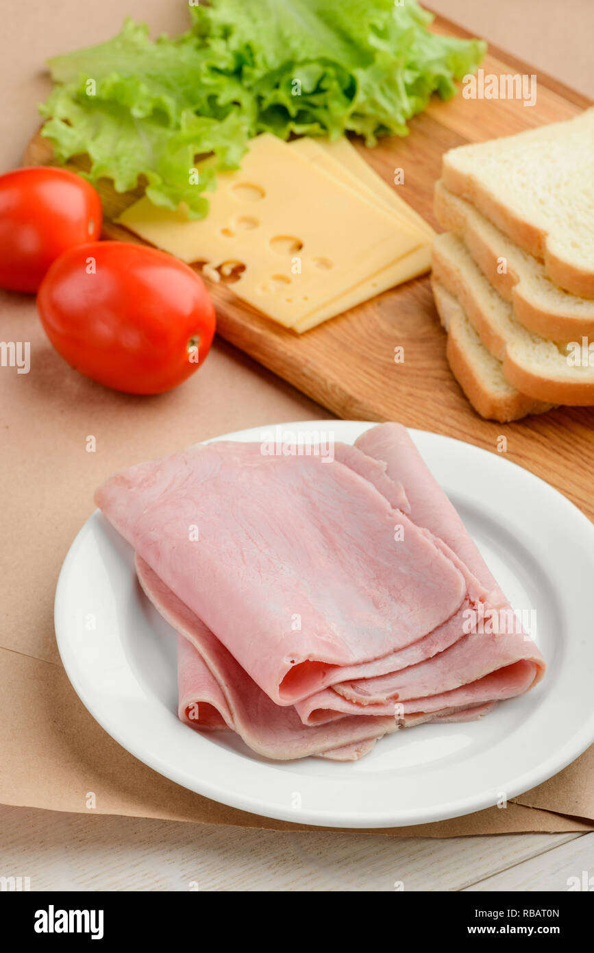 Ham, tomato, cheese, lettuce, bread Stock Photo - Alamy