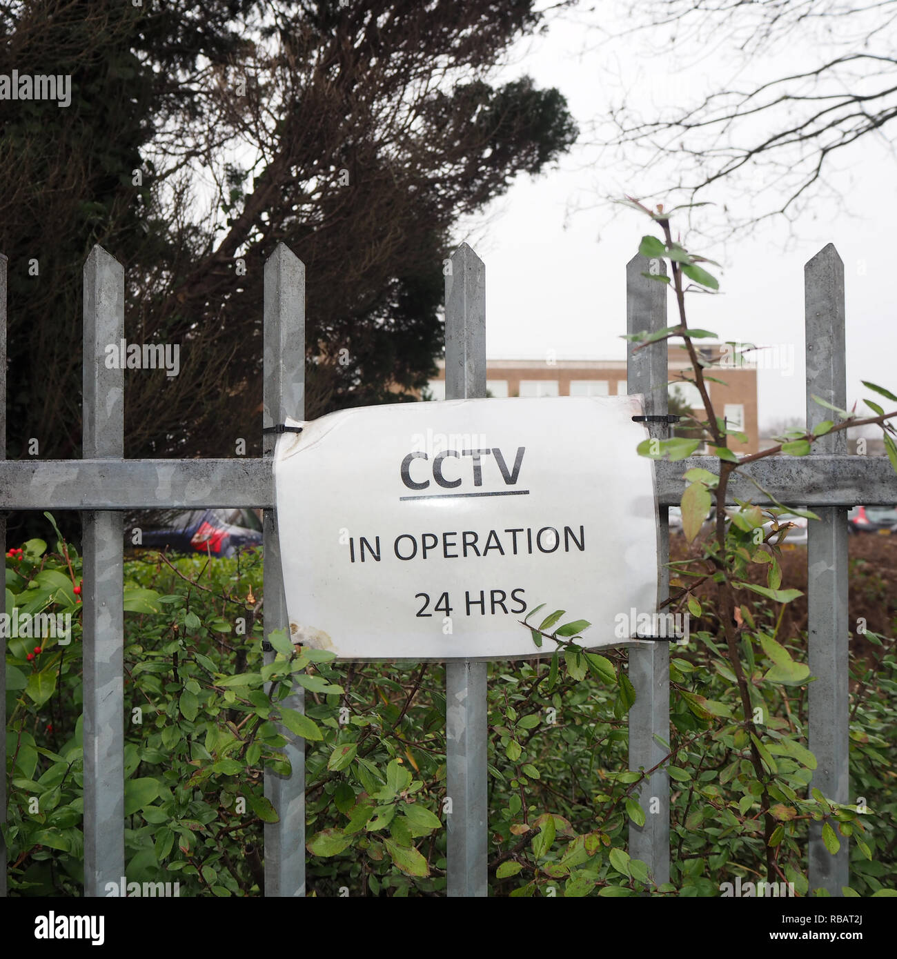 Warning sing attached to fence hi-res stock photography and images - Alamy