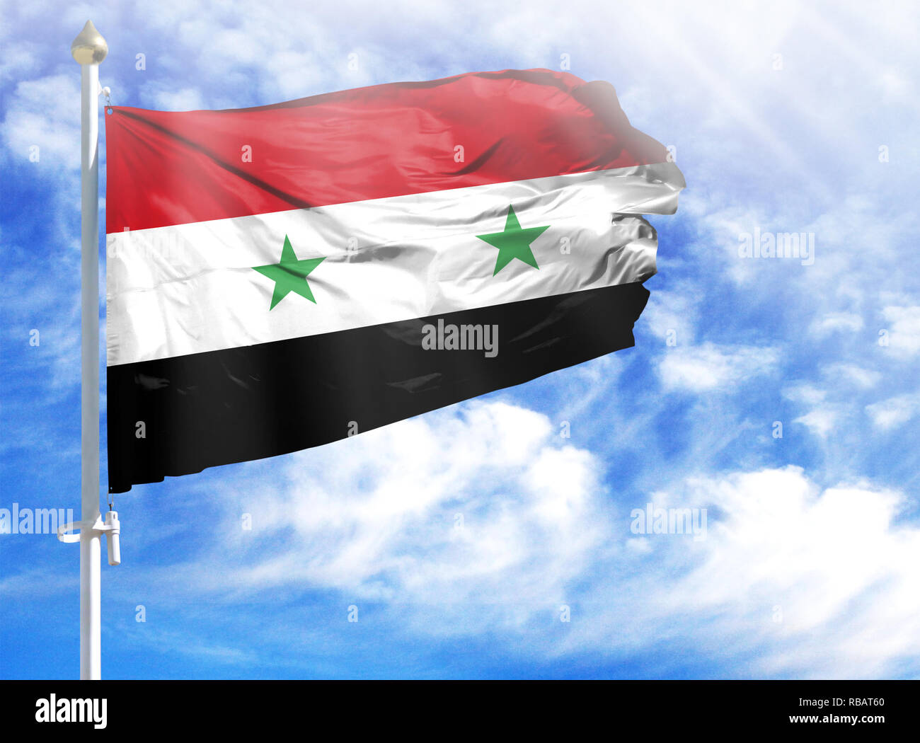 National flag of Syria on a flagpole in front of blue sky Stock Photo ...