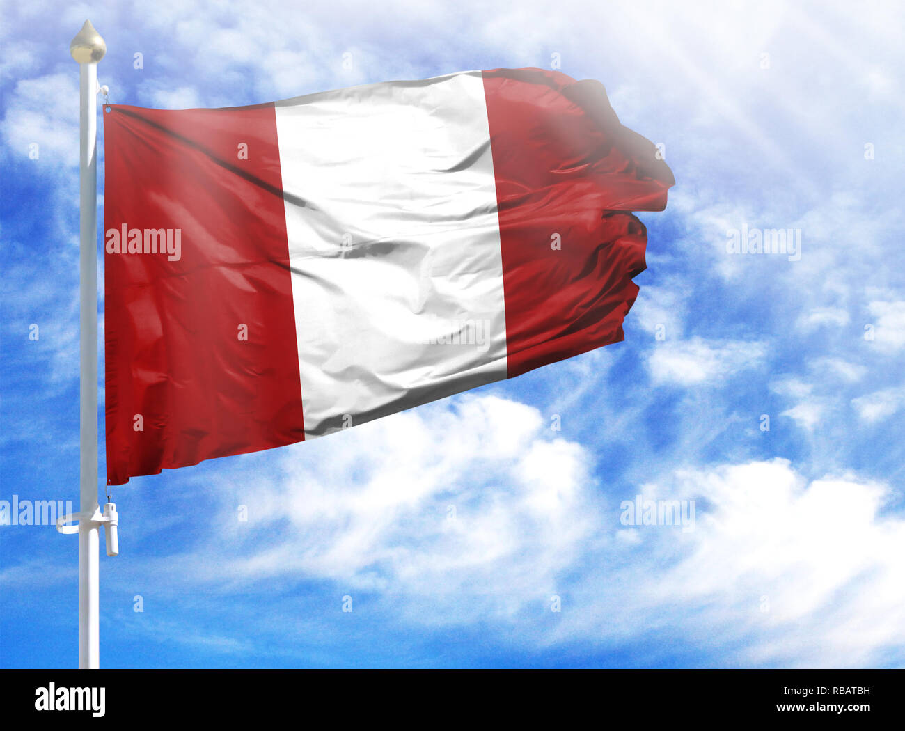 National flag of Peru on a flagpole in front of blue sky Stock Photo ...