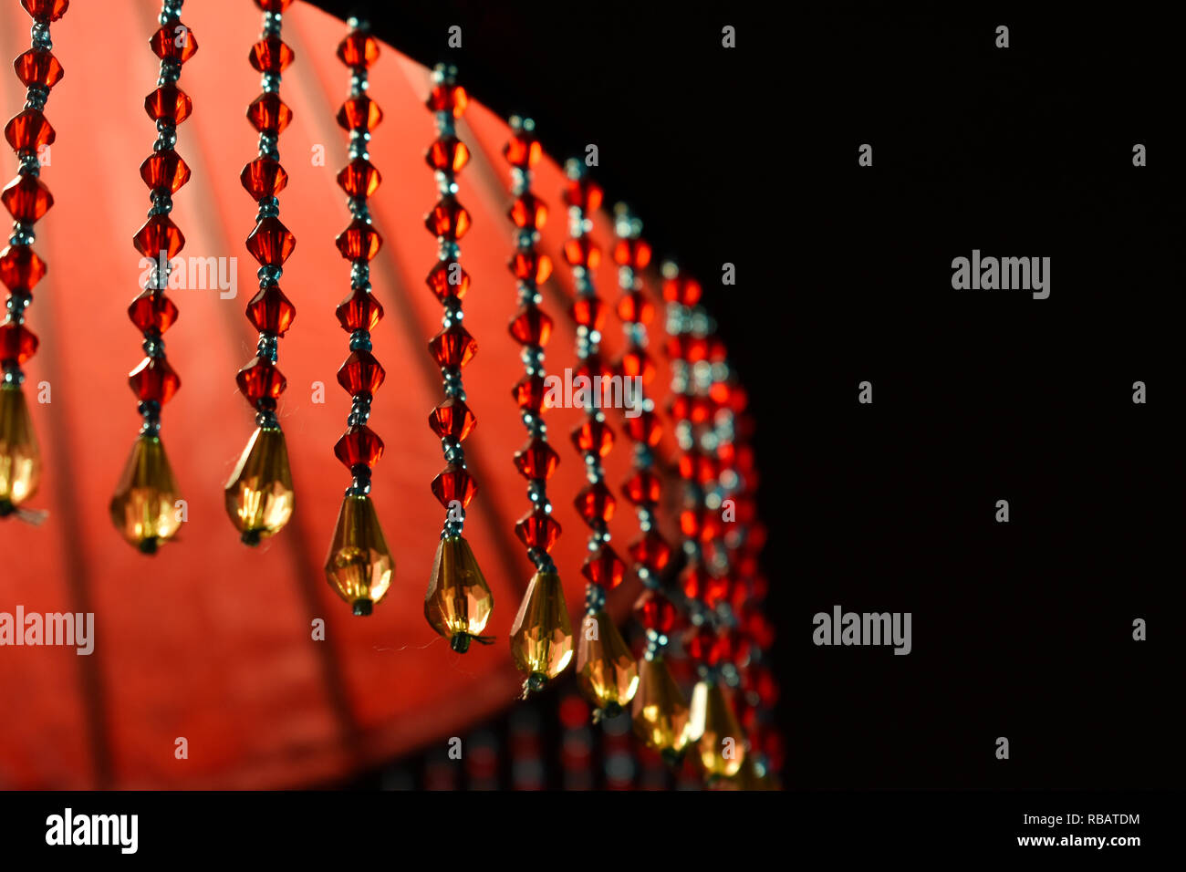 Red lamp with the light on. High contrast Stock Photo - Alamy