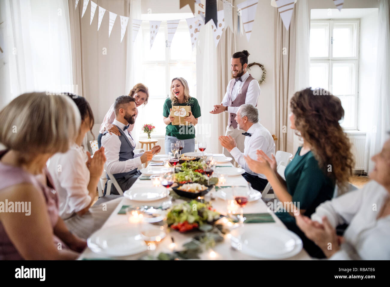 Woman clapping dinner party hi-res stock photography and images - Alamy