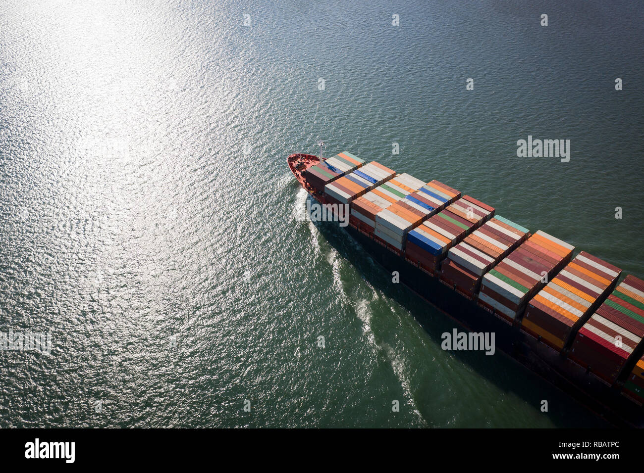 Aerial view of a container ship going upstream in the St. Lawrence ...