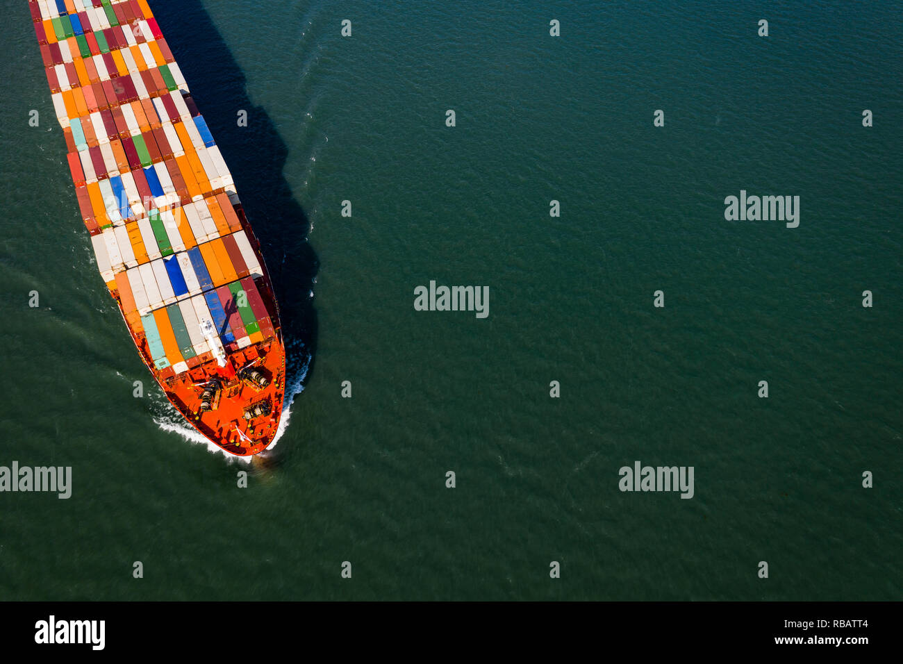 Aerial view of a container ship going upstream in the St. Lawrence ...