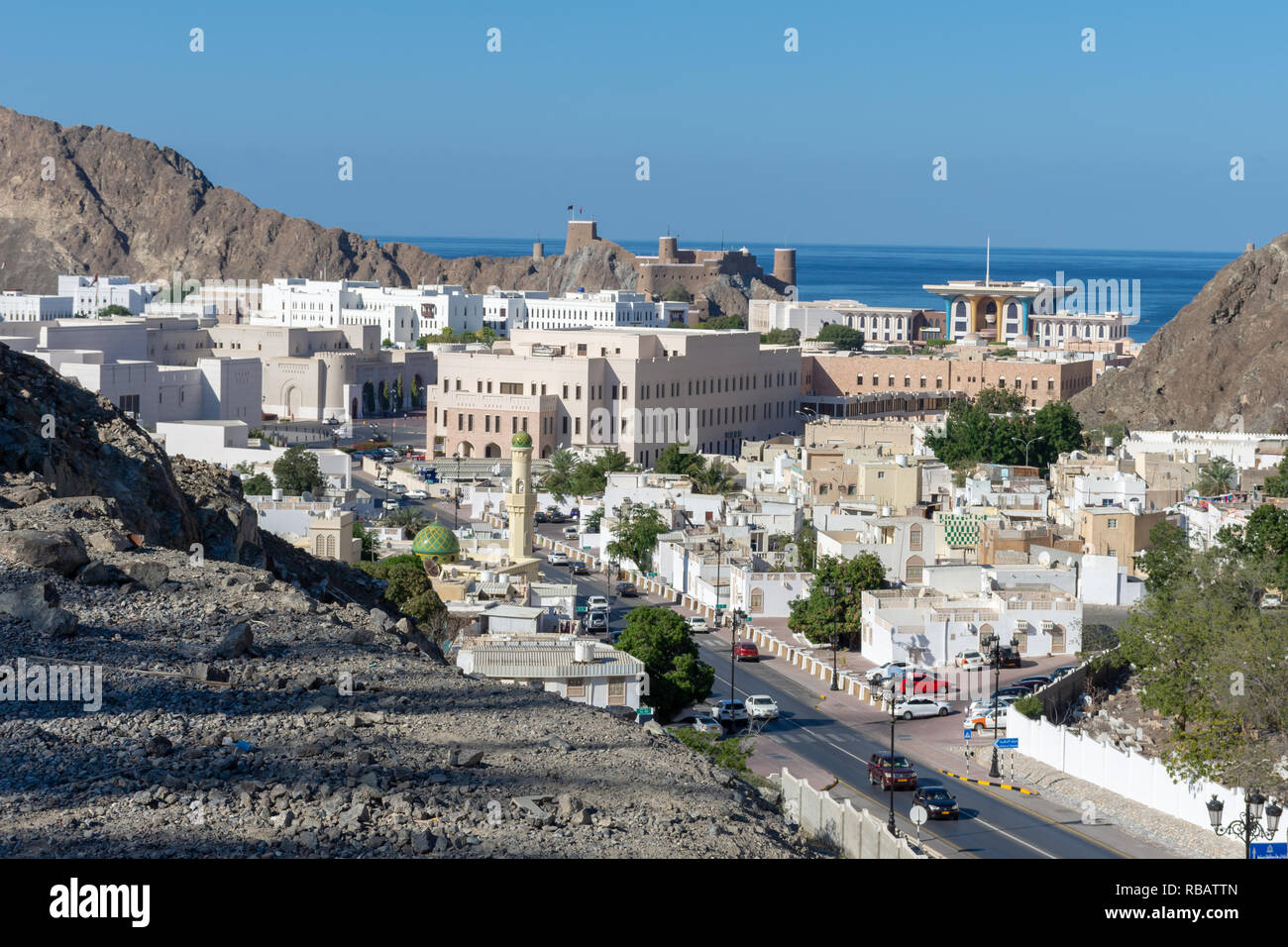 Old Town in Muscat, Oman from a mountain top on a beautiful blue sky ...