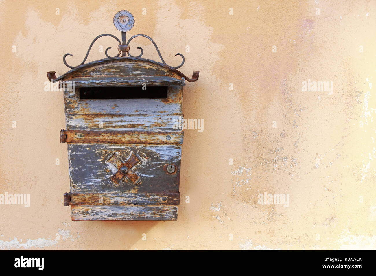 very old mailbox on a house wall, retro object Stock Photo - Alamy