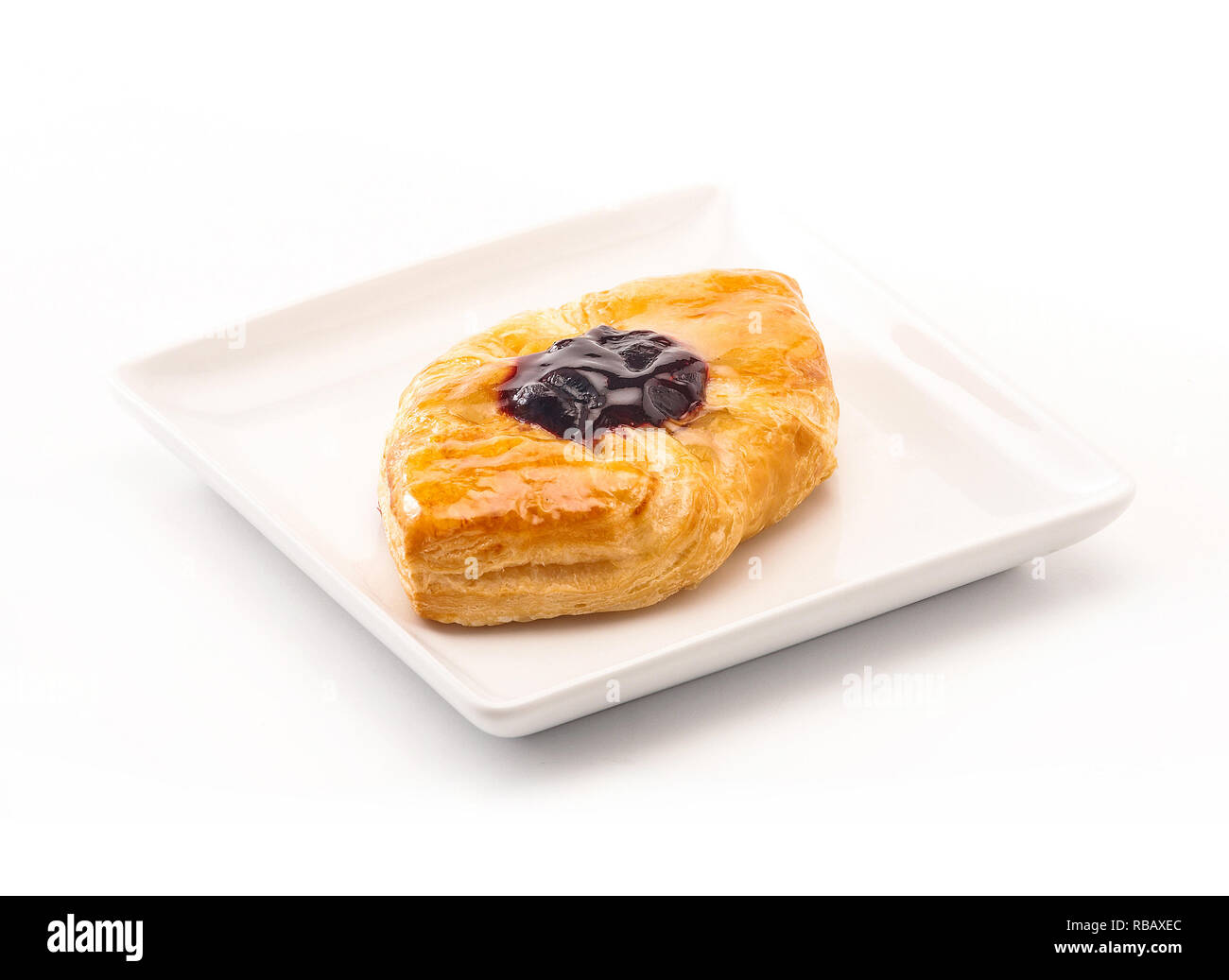 Delicious Danish pastry on white background Stock Photo - Alamy