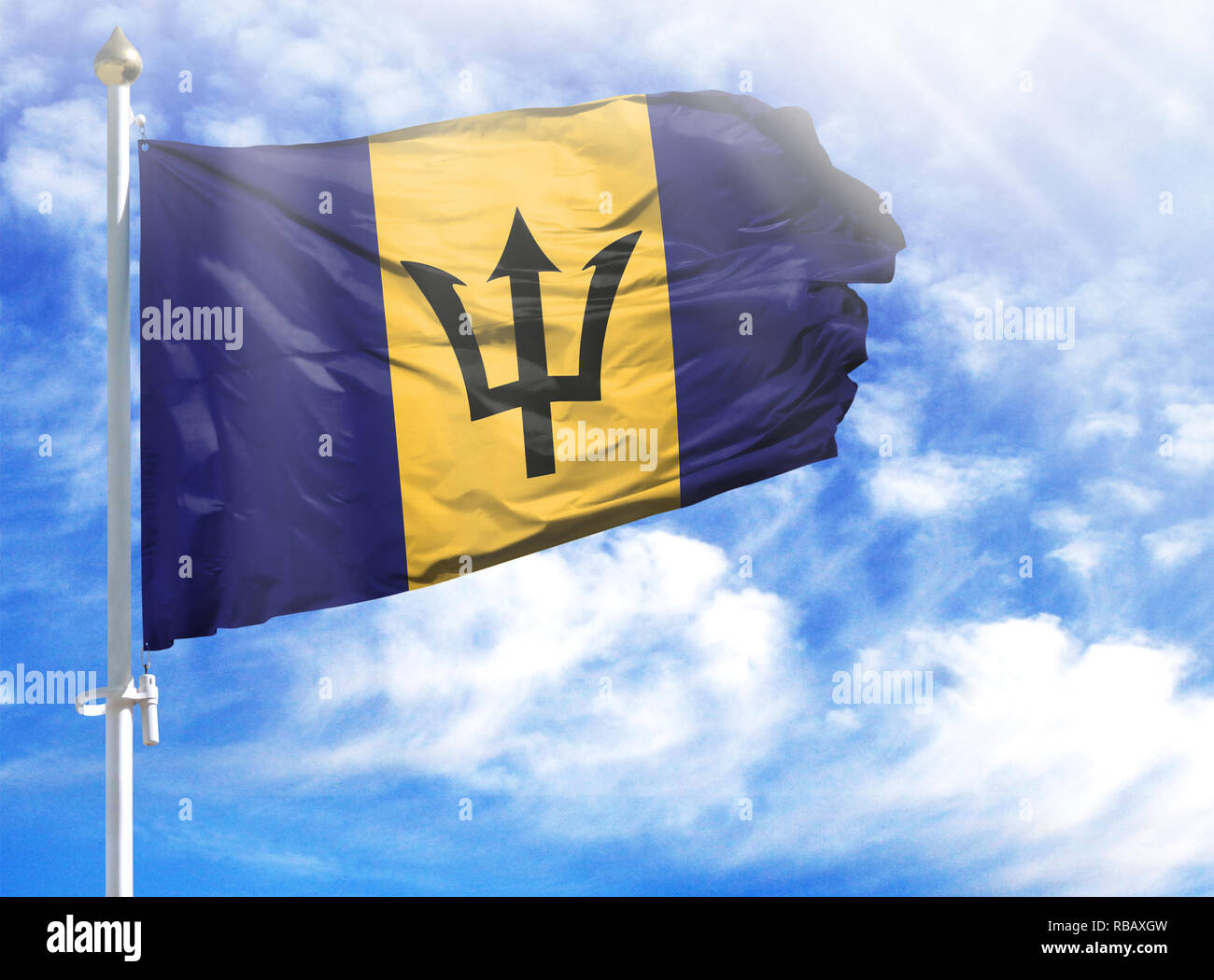 National flag of Barbados on a flagpole in front of blue sky Stock ...