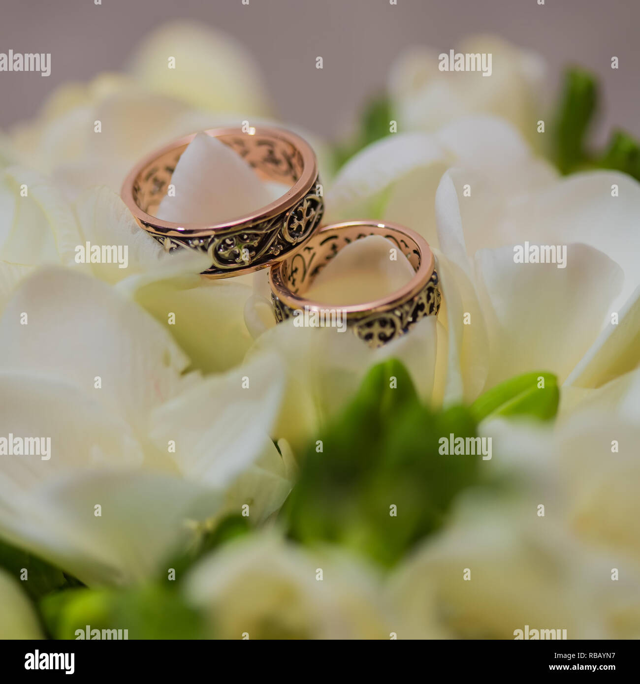 Two wedding rings in infinity sign. Love concept Stock Photo - Alamy