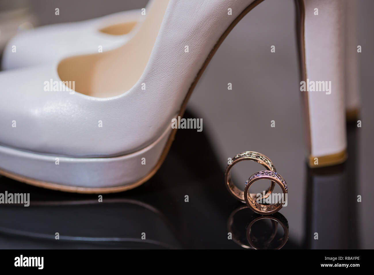 Two wedding rings in infinity sign. Love concept Stock Photo - Alamy