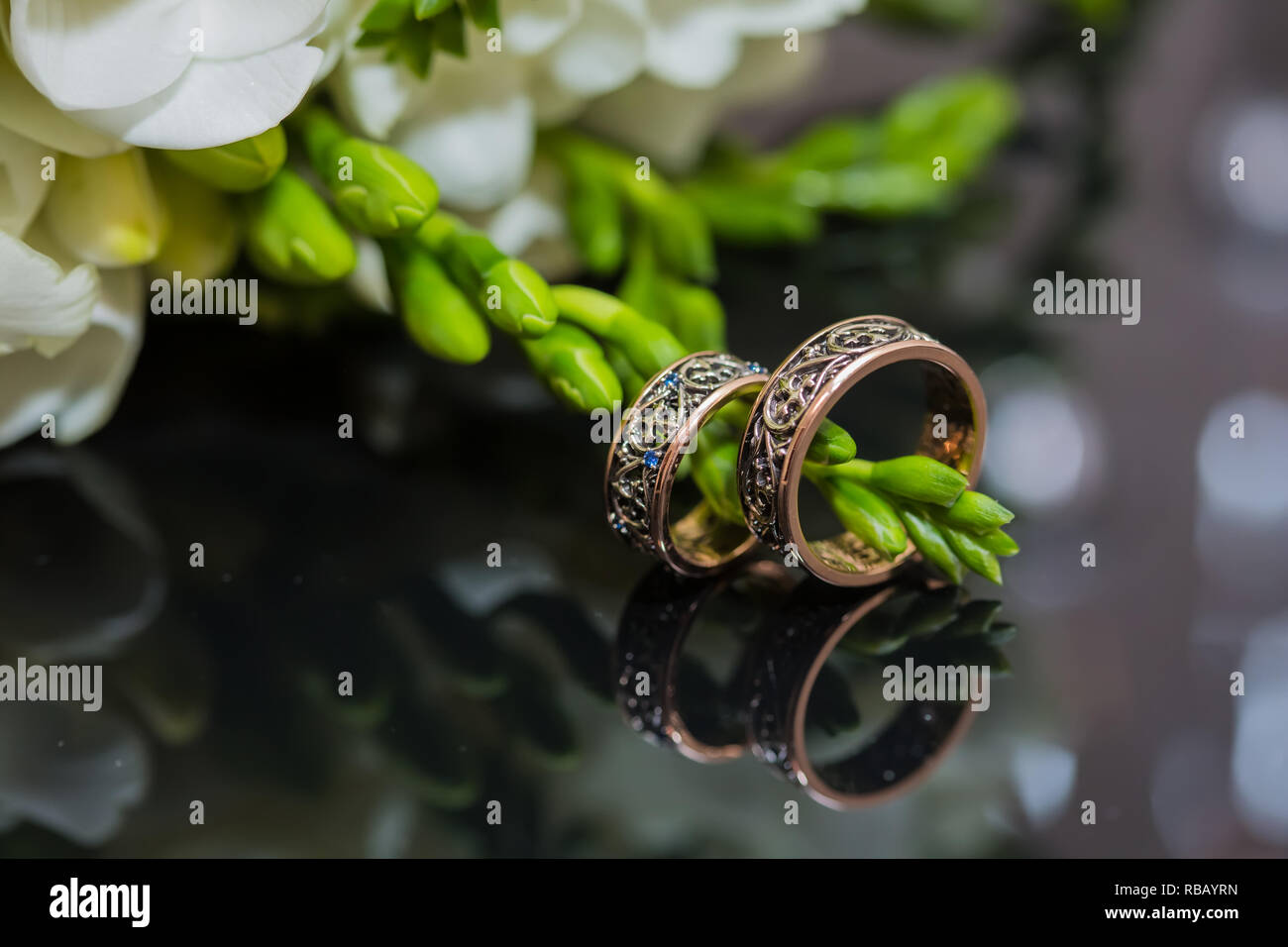 Two wedding rings in infinity sign. Love concept Stock Photo - Alamy
