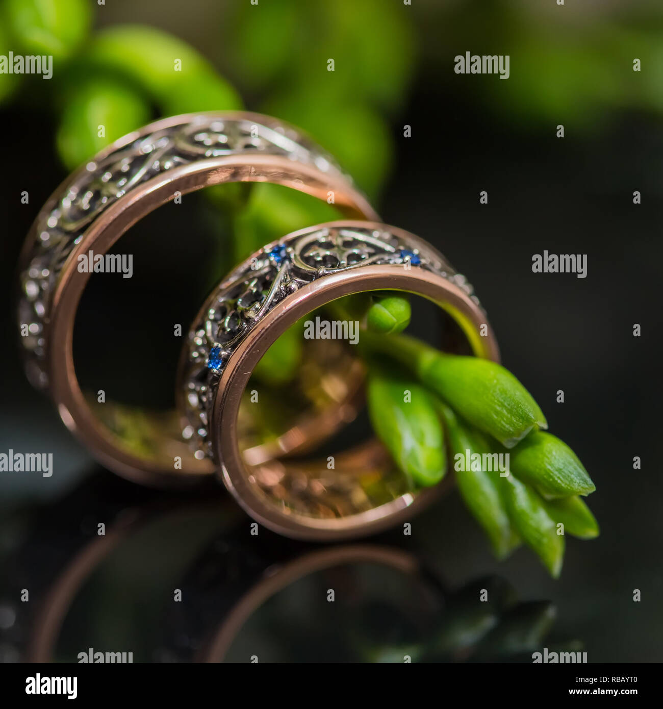 Two wedding rings in infinity sign. Love concept Stock Photo - Alamy