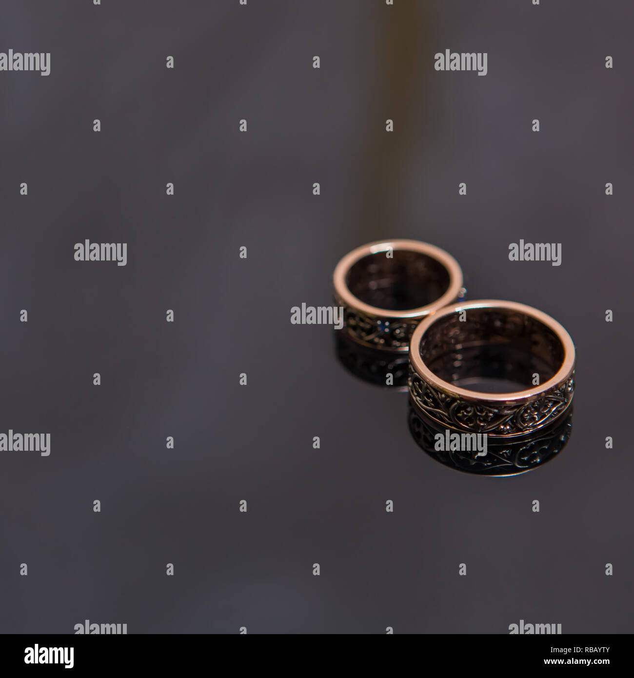 Two wedding rings in infinity sign. Love concept Stock Photo - Alamy