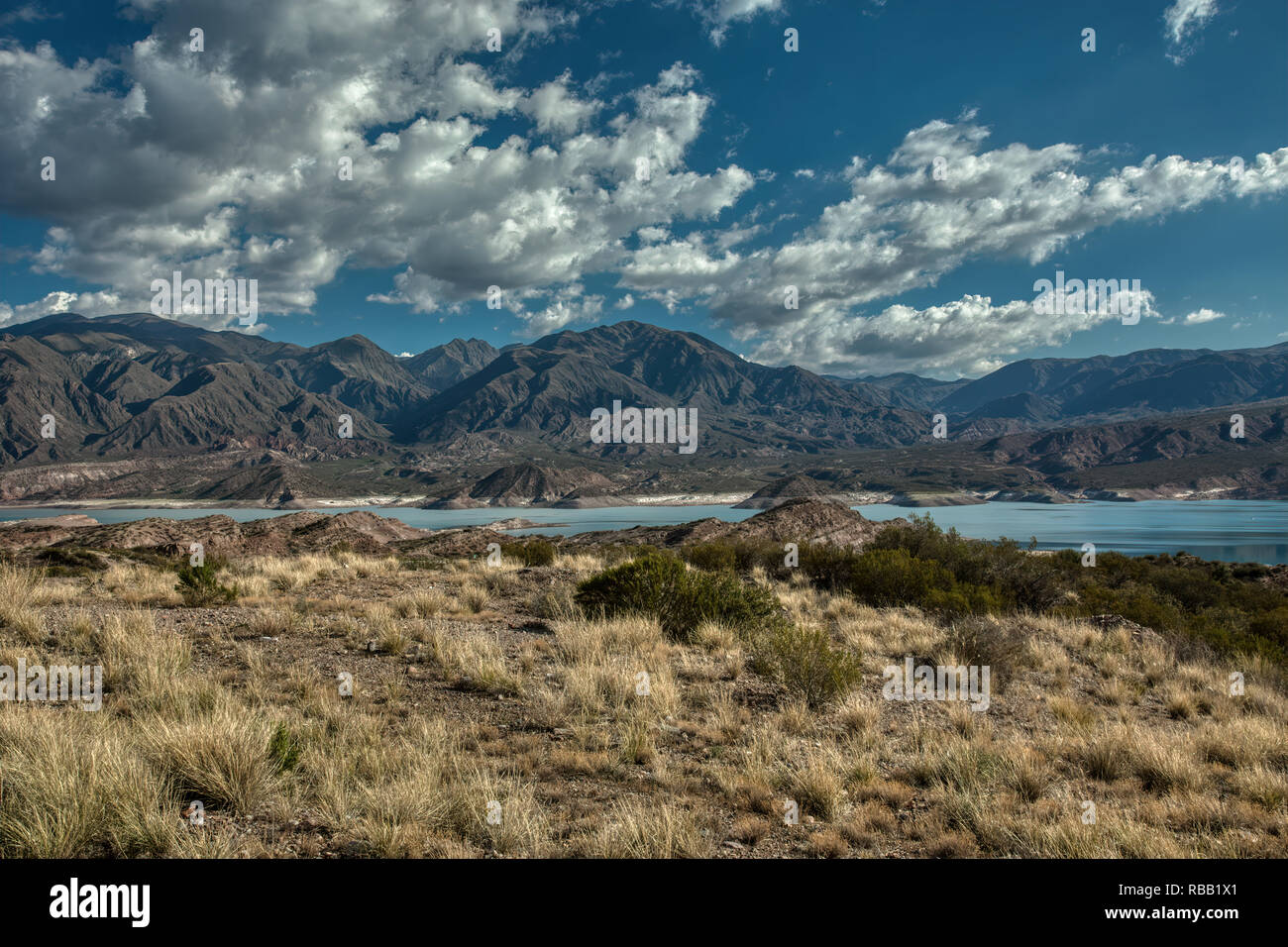Potrerillos Dam Lake in Mendoza Argentina view of the Andes under a ...