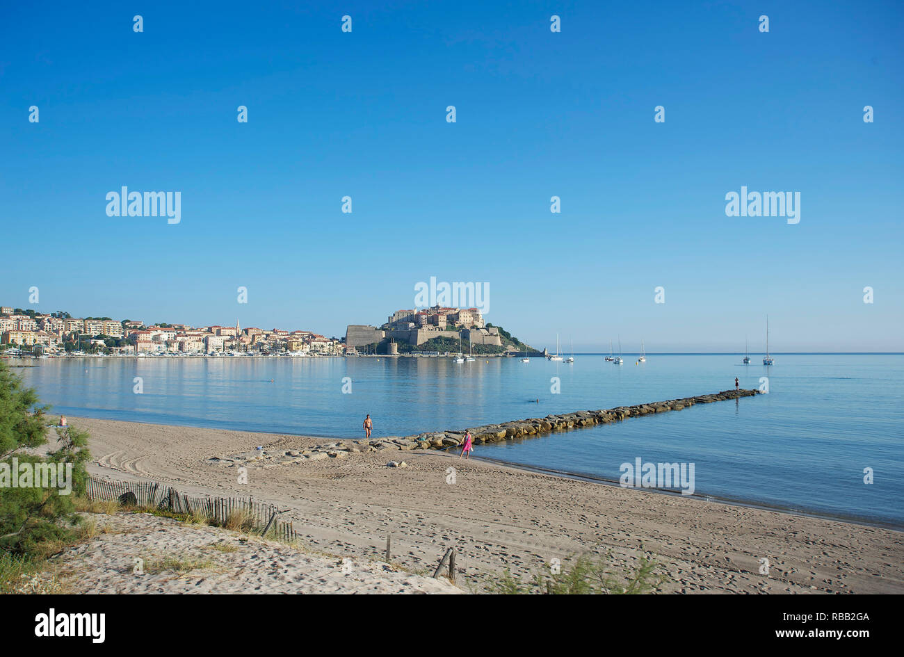View from the train of citadel from Calvi beach, Corsica Stock Photo ...