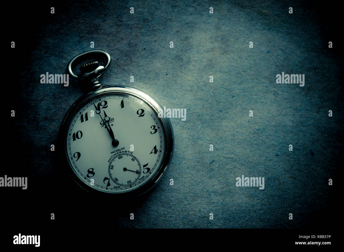 pocket clock indicating two minutes to midnight, concept for doomsday ...