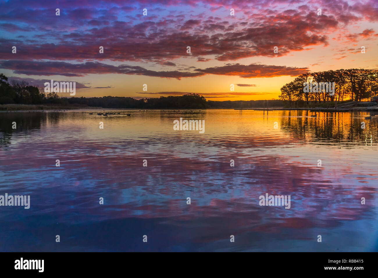 Beautiful sunset over lake Stock Photo - Alamy