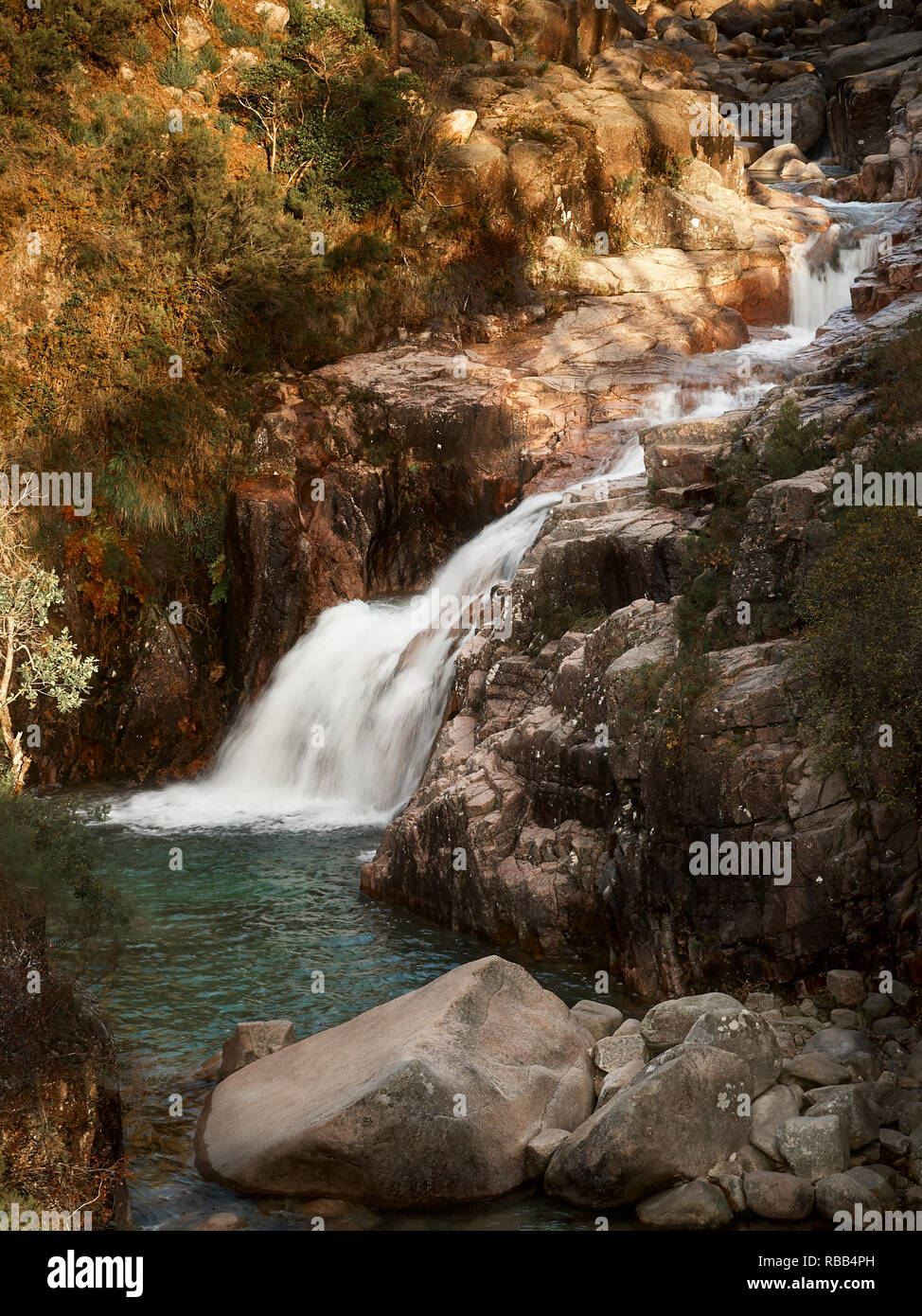Waterfall pond in autumn hi-res stock photography and images - Alamy