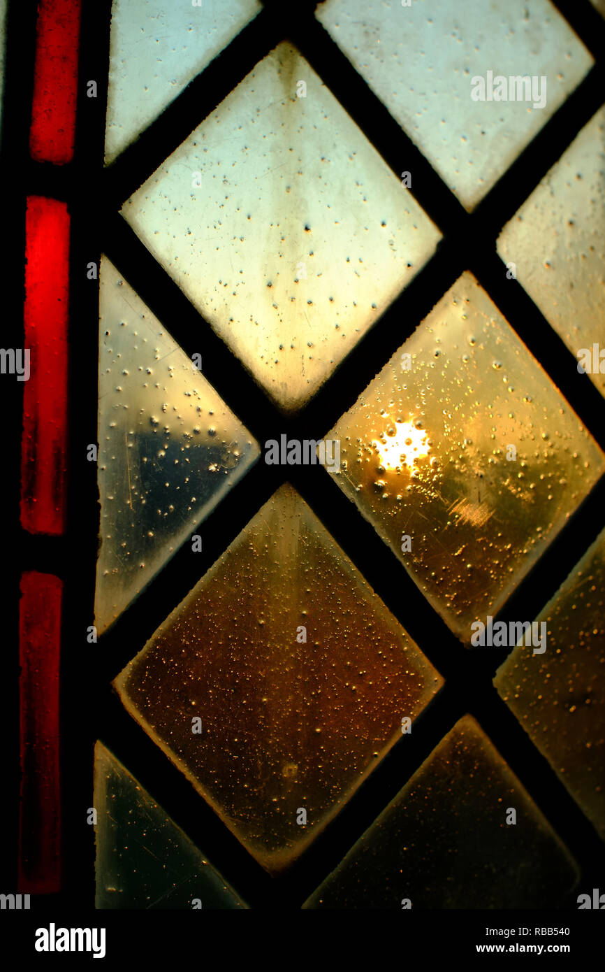 Detail of an old leaded stained glass window Stock Photo - Alamy