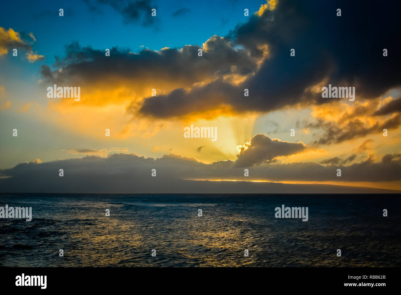Colorful sunset at Kahana Beach, Maui, Hawaiian Islands Stock Photo - Alamy
