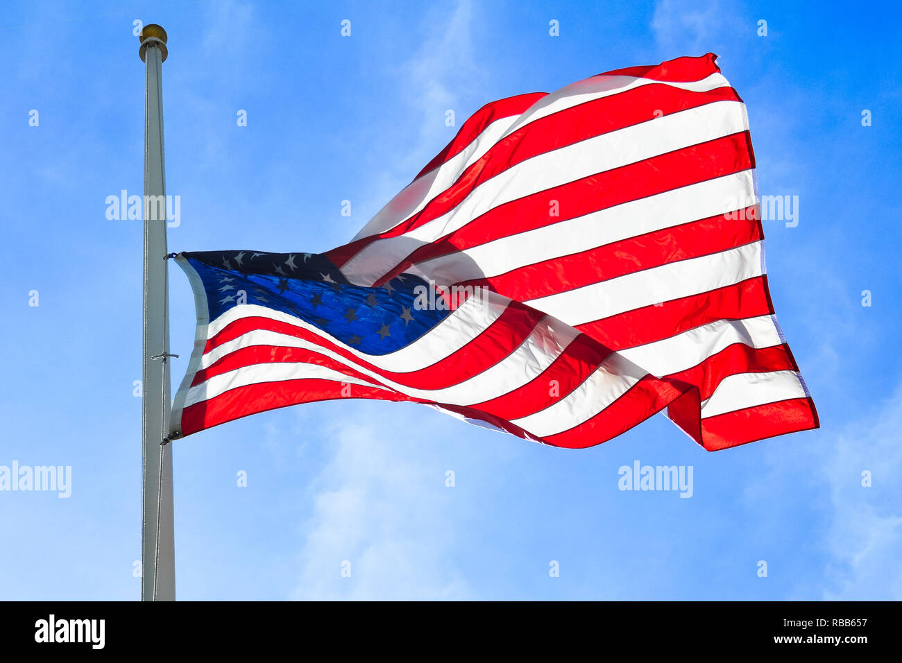 American flag blowing in the wind hi-res stock photography and images ...