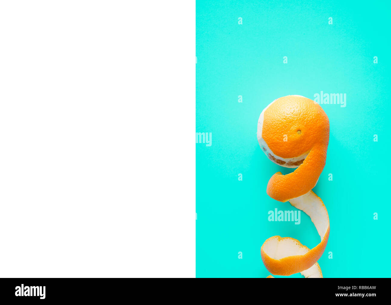 Orange slice on blue background.Ribbon fruit ideas Stock Photo - Alamy