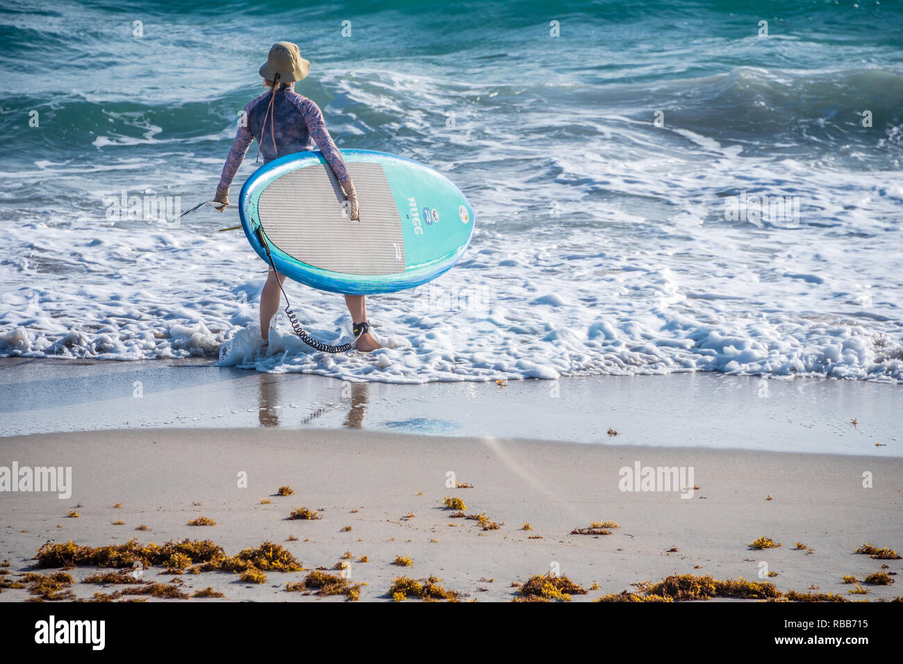 Paddle surfer hi-res stock photography and images - Alamy