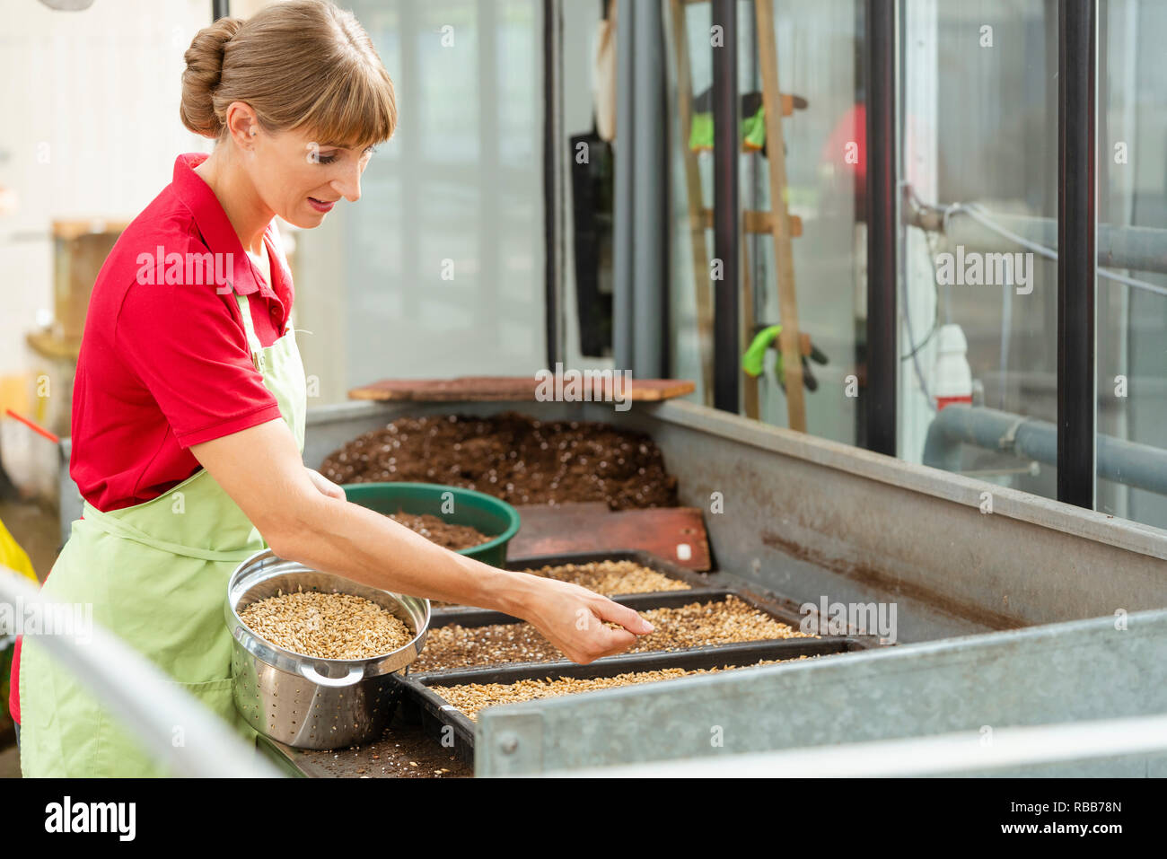 Sowing seeds woman hi-res stock photography and images - Alamy