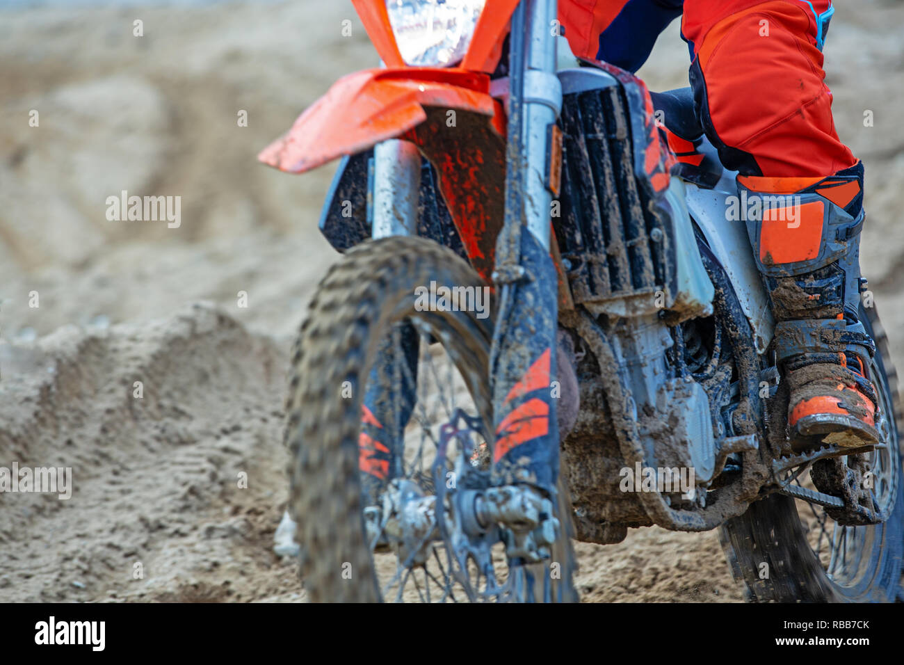 Professional Motocross Motorcycle Rider Drives Over the Dirt Road Track ...