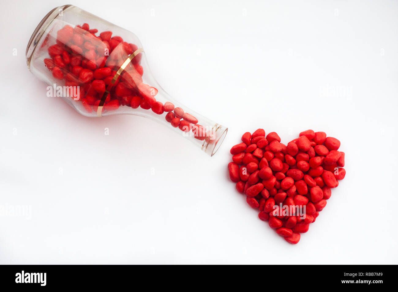 red heart of candy and bottle Stock Photo - Alamy