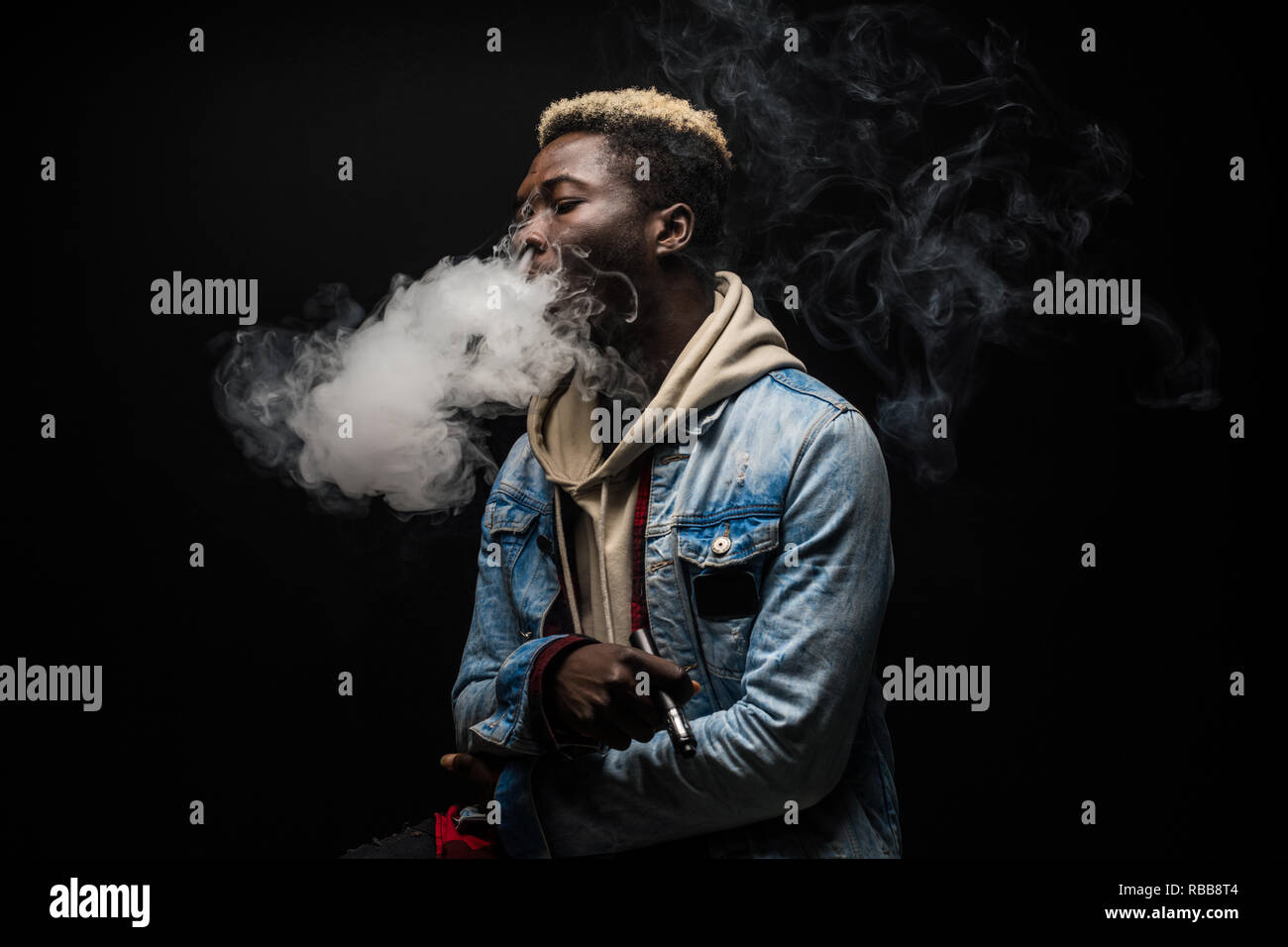 Girl smoking vape vaping inhaling hi-res stock photography and images ...