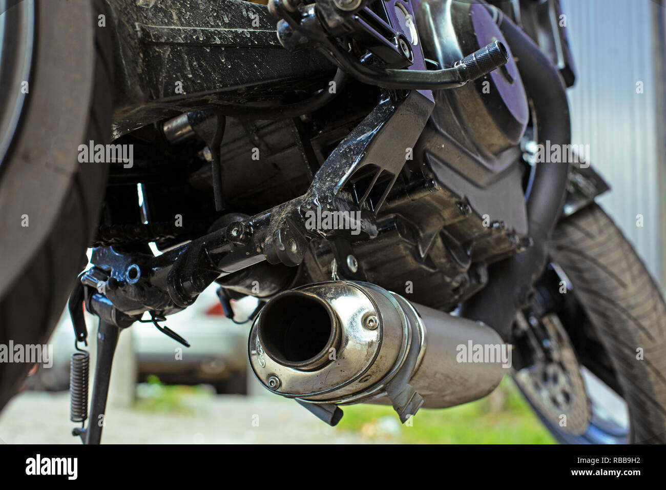 Cropped close up shot of beautiful and custom made motorcycle in the ...