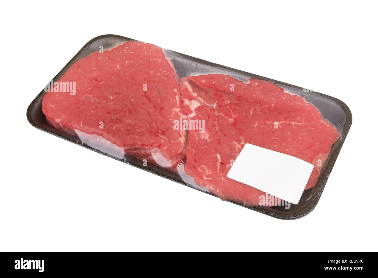 Fresh raw meat in package isolated on white background Stock Photo - Alamy