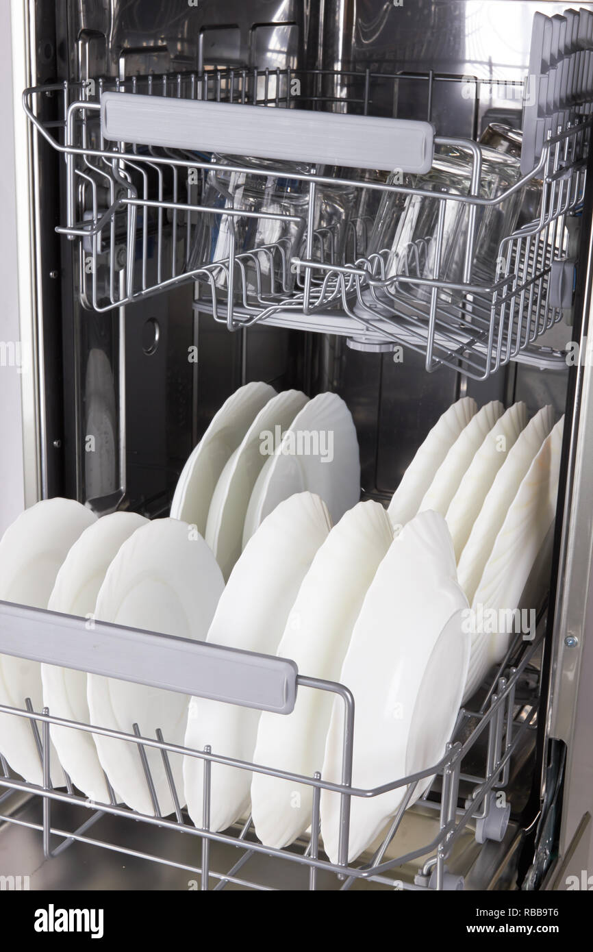 Dishwasher machine isolated on a white background Stock Photo - Alamy
