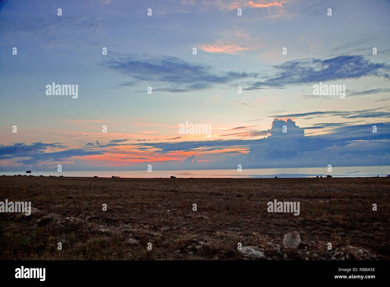 sunset or sunrise on the beach. minimalist scene Stock Photo - Alamy
