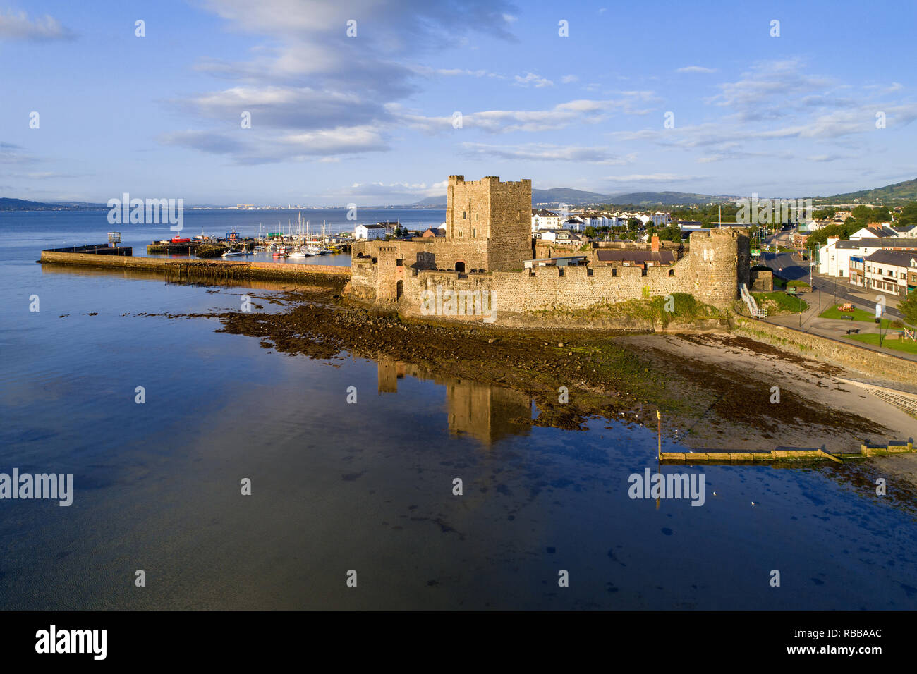 Medieval Norman Castle in Carrickfergus near Belfast in sunrise light ...