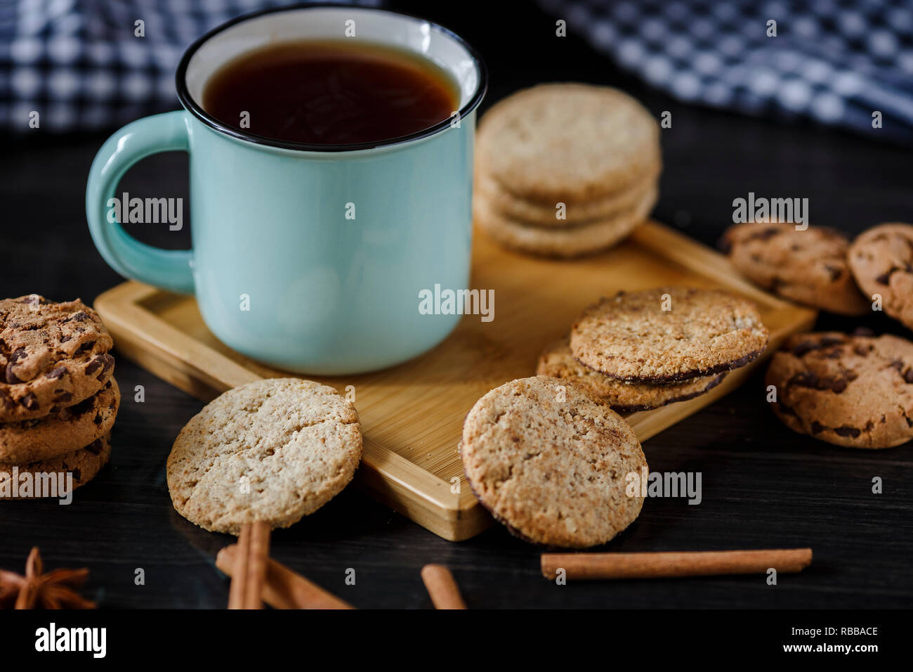 Cup of tea and various cookies Stock Photo - Alamy