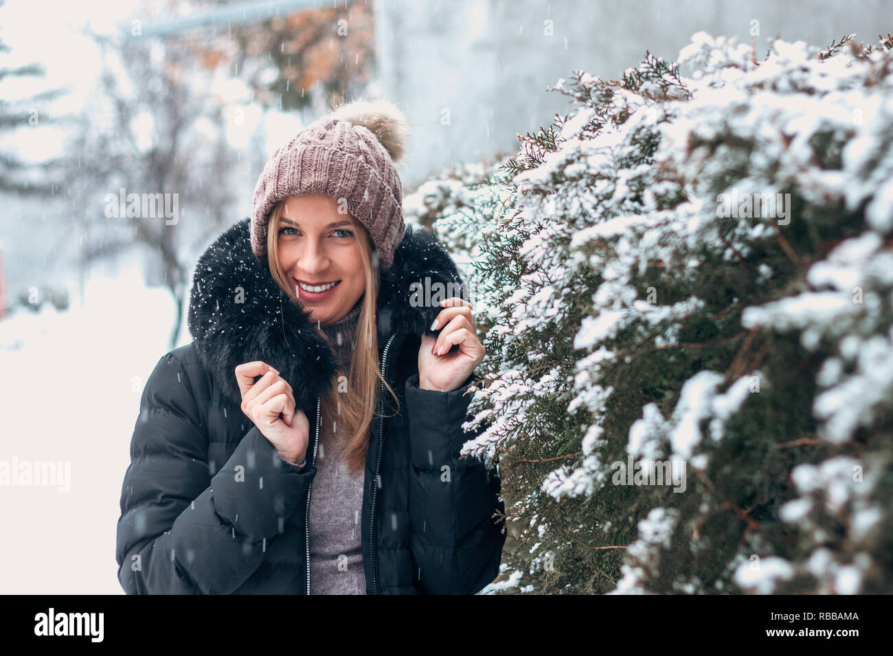 Young beautiful happy smiling girl walking on street Stock Photo - Alamy