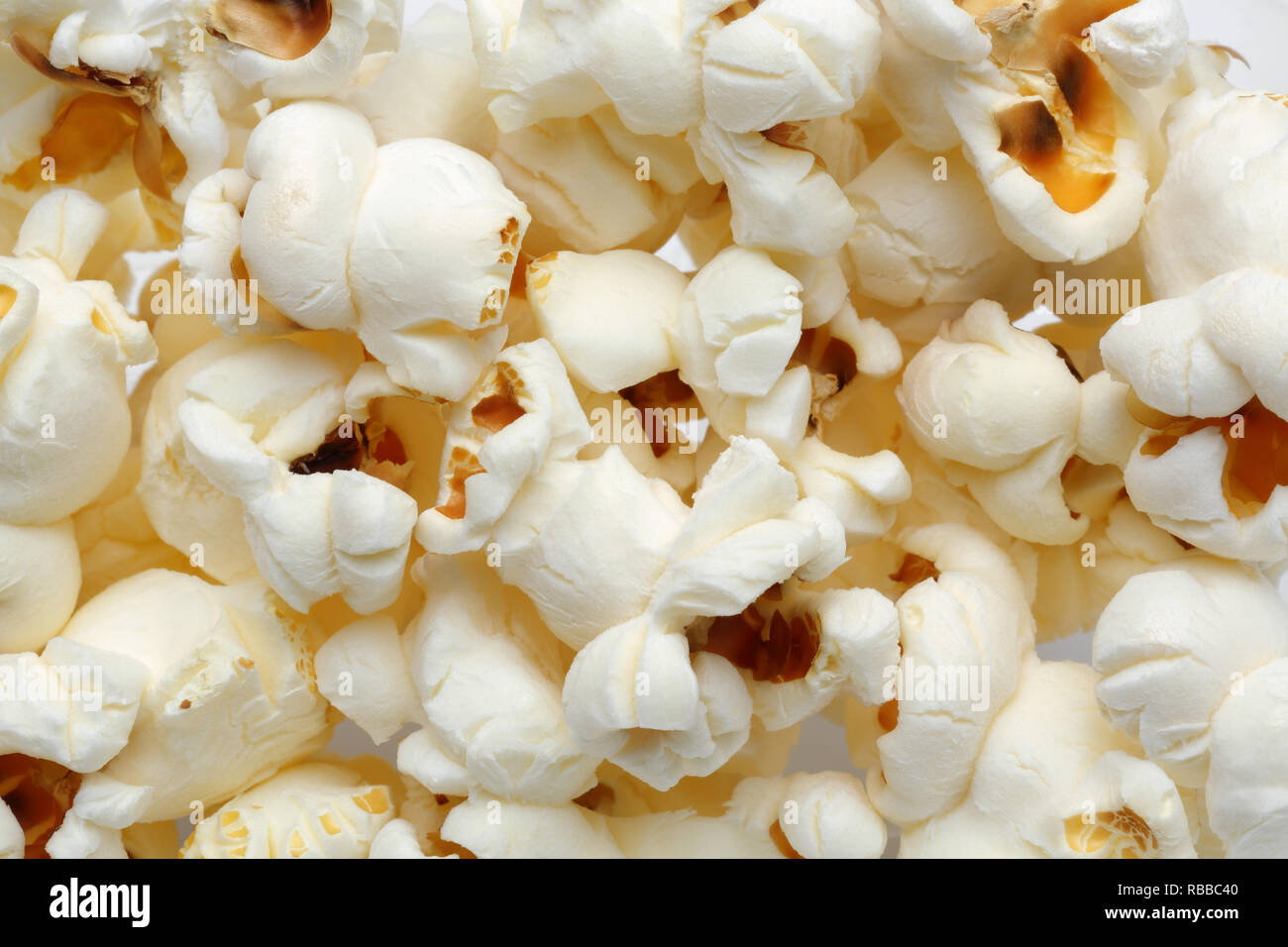 Background of popcorn, top view macro shot Stock Photo - Alamy