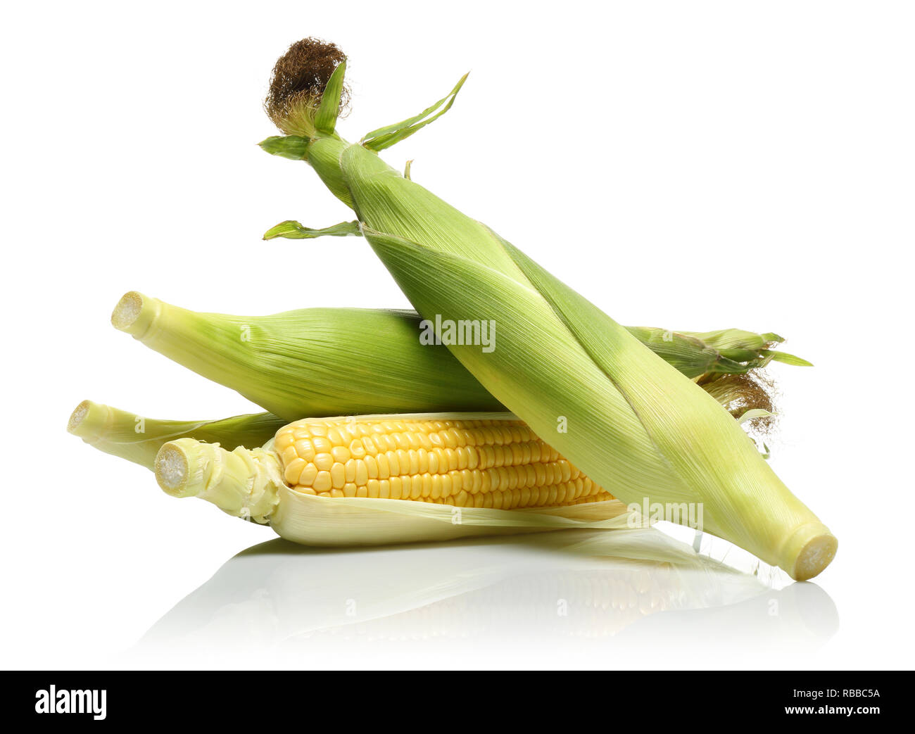 Fresh corns isolated on a white background Stock Photo - Alamy