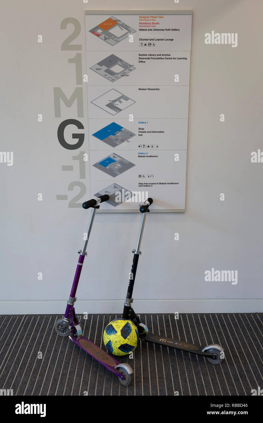 A football and two scooters lean against a floor plan of Kensington's ...