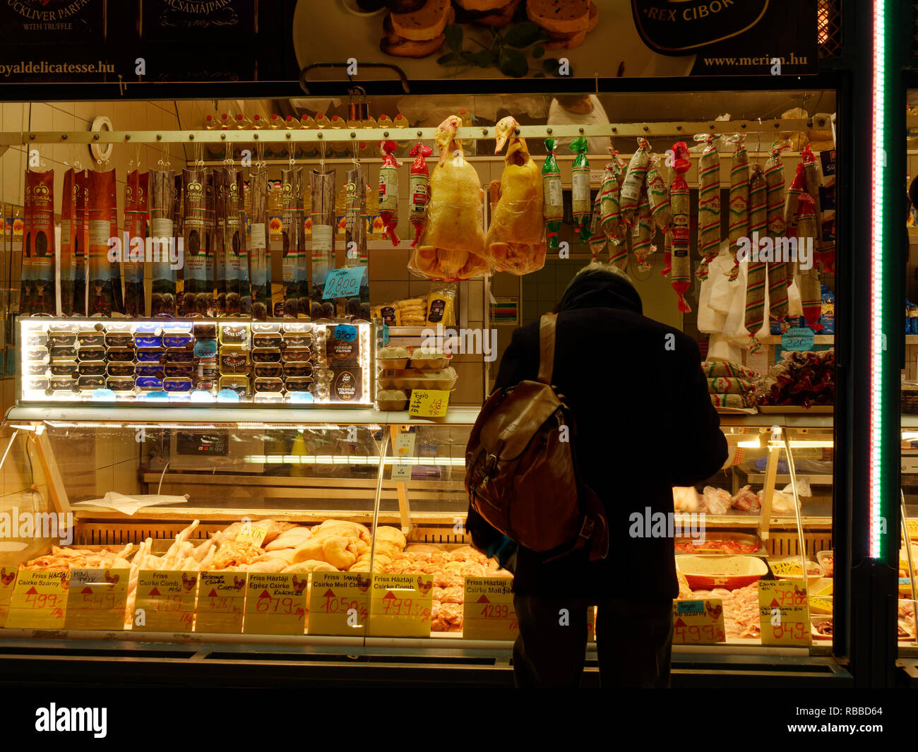 Man buying meat hi-res stock photography and images - Alamy